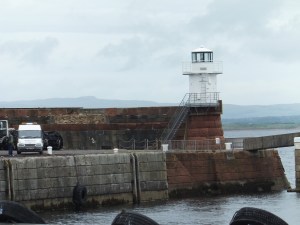 A hint of lighthouse and returning to the scene of the crime ...